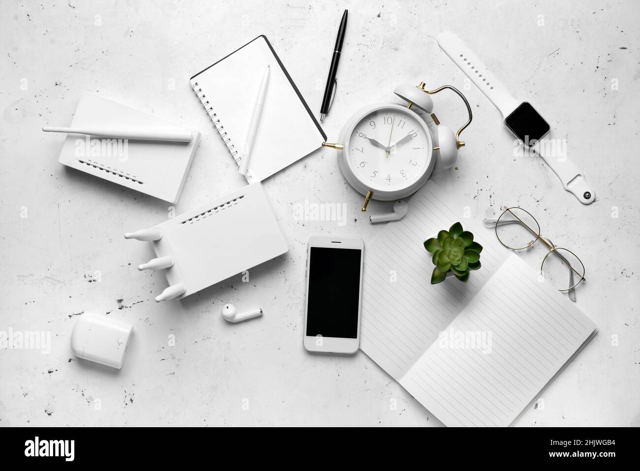 Different gadgets on light background Stock Photo - Alamy