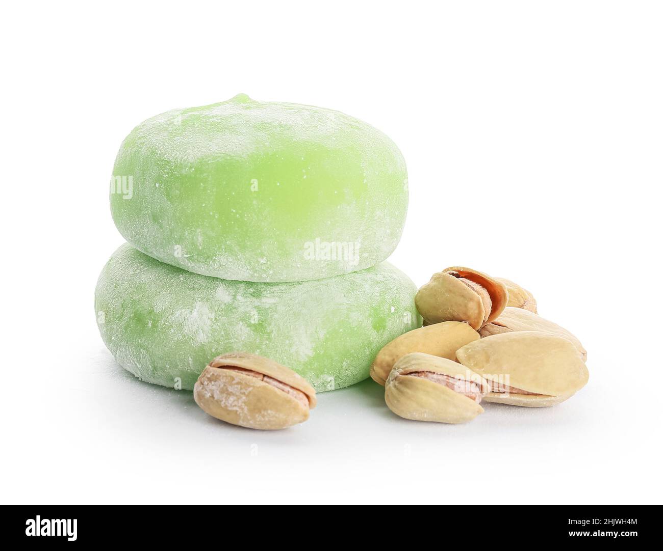 Delicious mochi and pistachios on white background Stock Photo - Alamy