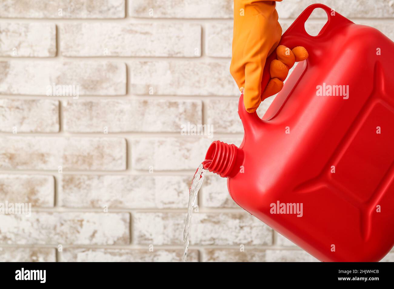Gasoline canister spout pouring hi-res stock photography and images - Alamy