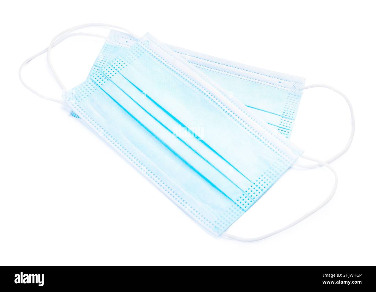Stack of medical masks on white background Stock Photo - Alamy