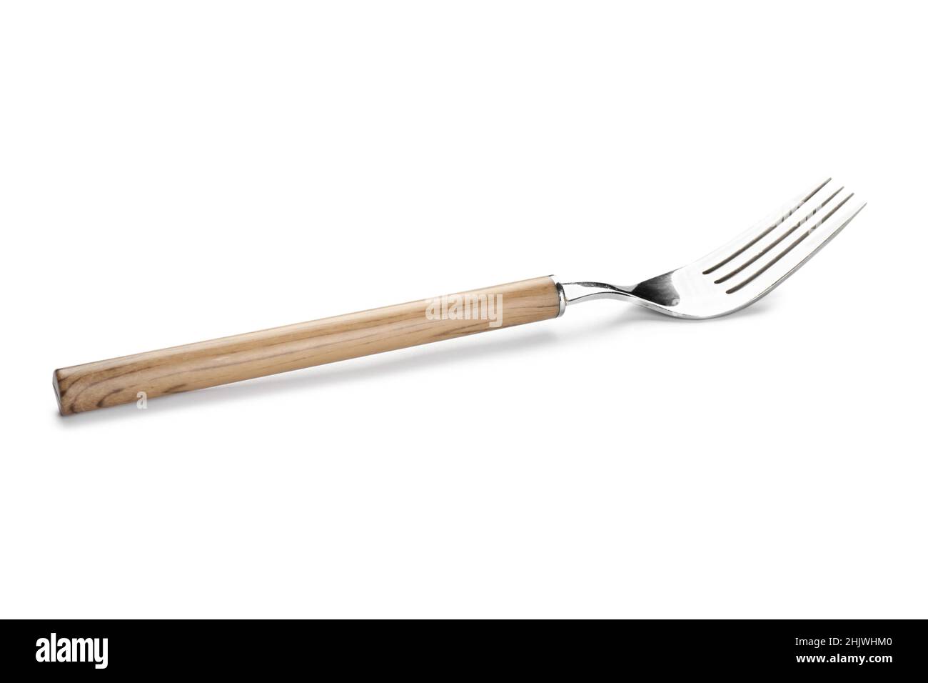 Stainless steel fork with wooden handle on white background Stock Photo ...