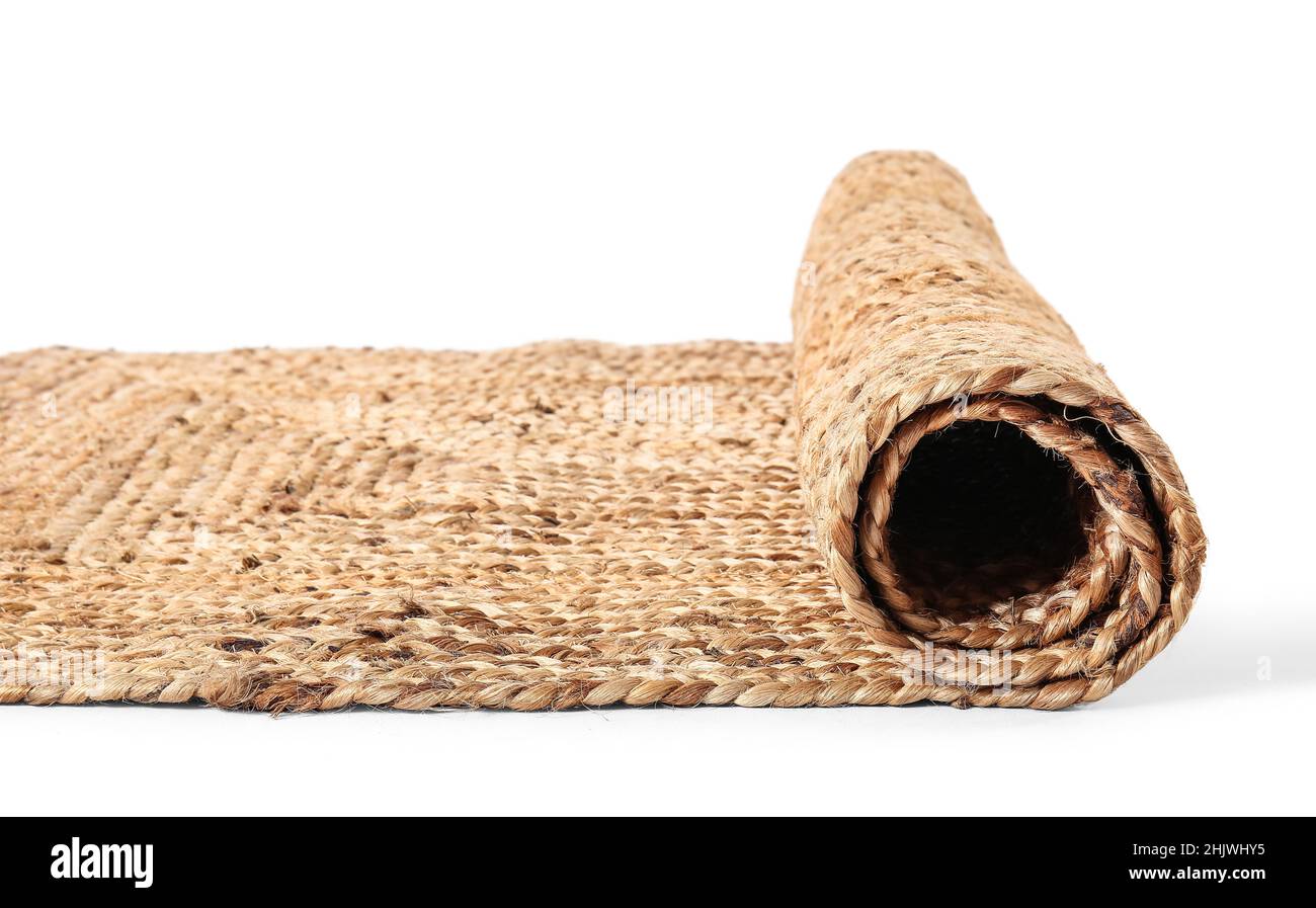 Stylish wicker rug on white background Stock Photo - Alamy