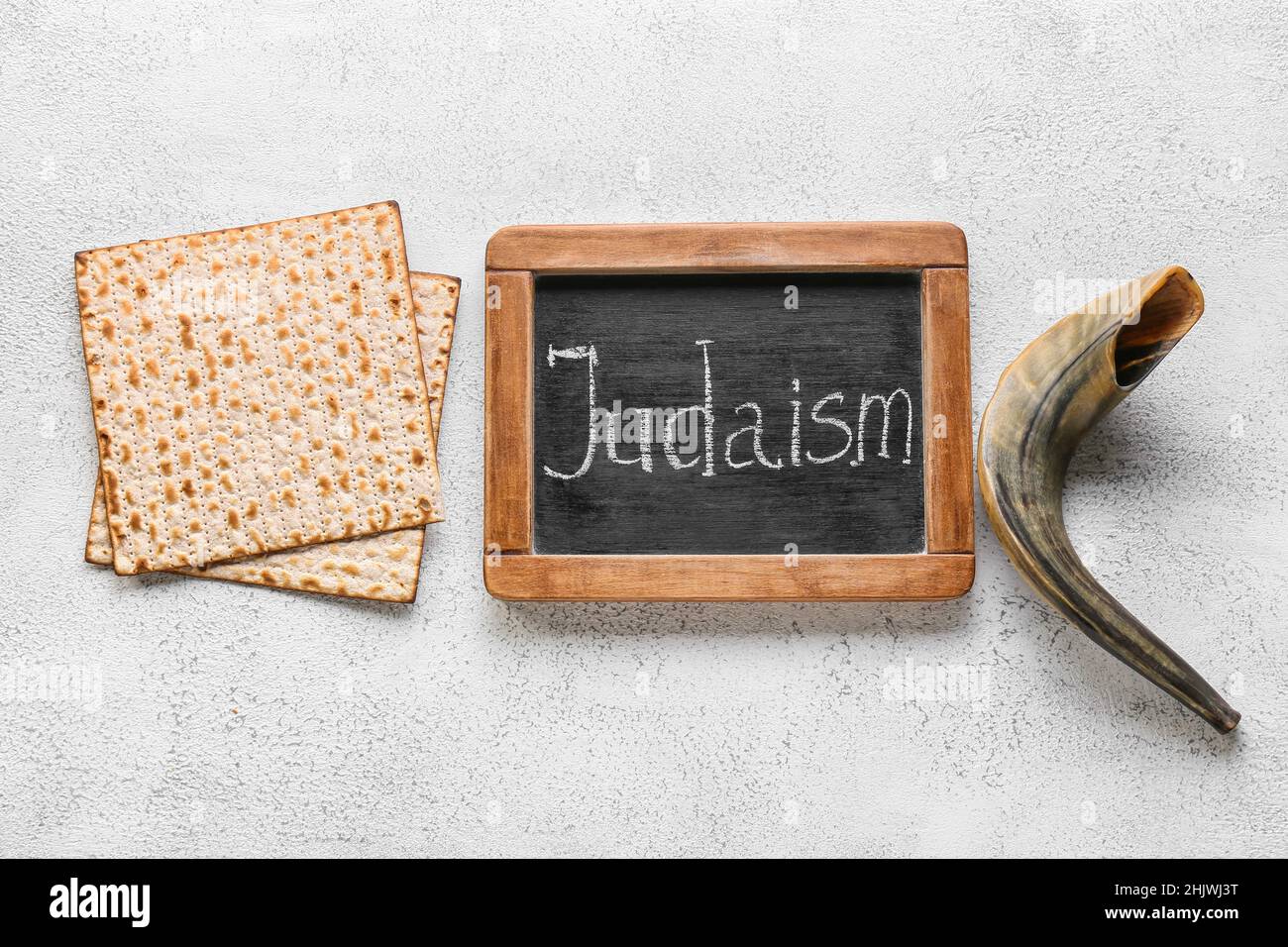Composition with symbols of Judaism on light background Stock Photo - Alamy