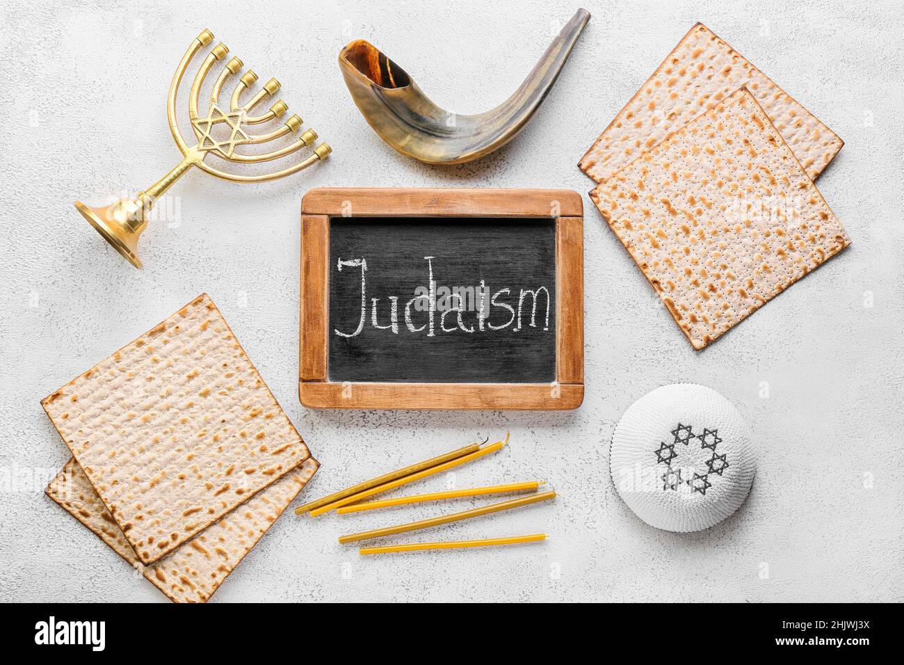 Composition with symbols of Judaism on light background Stock Photo - Alamy