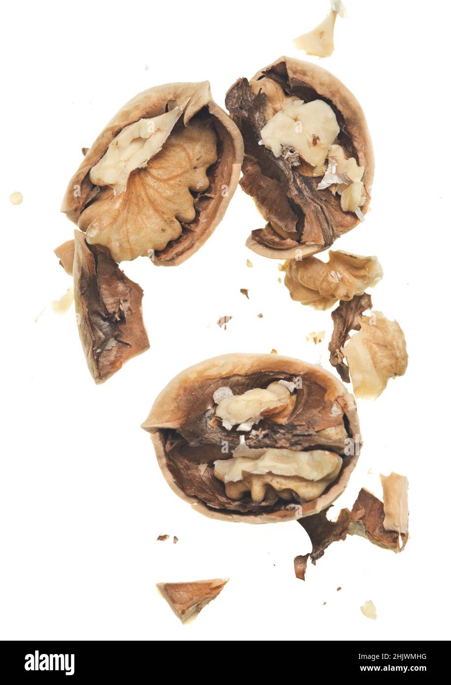 Cracked walnut isolated on white background Stock Photo - Alamy