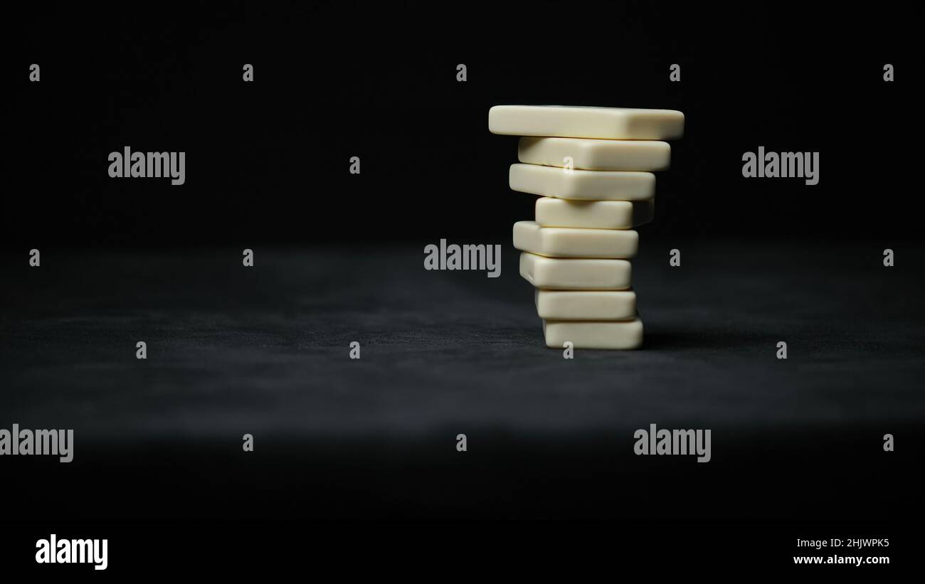 Domino pyramid hi-res stock photography and images - Alamy