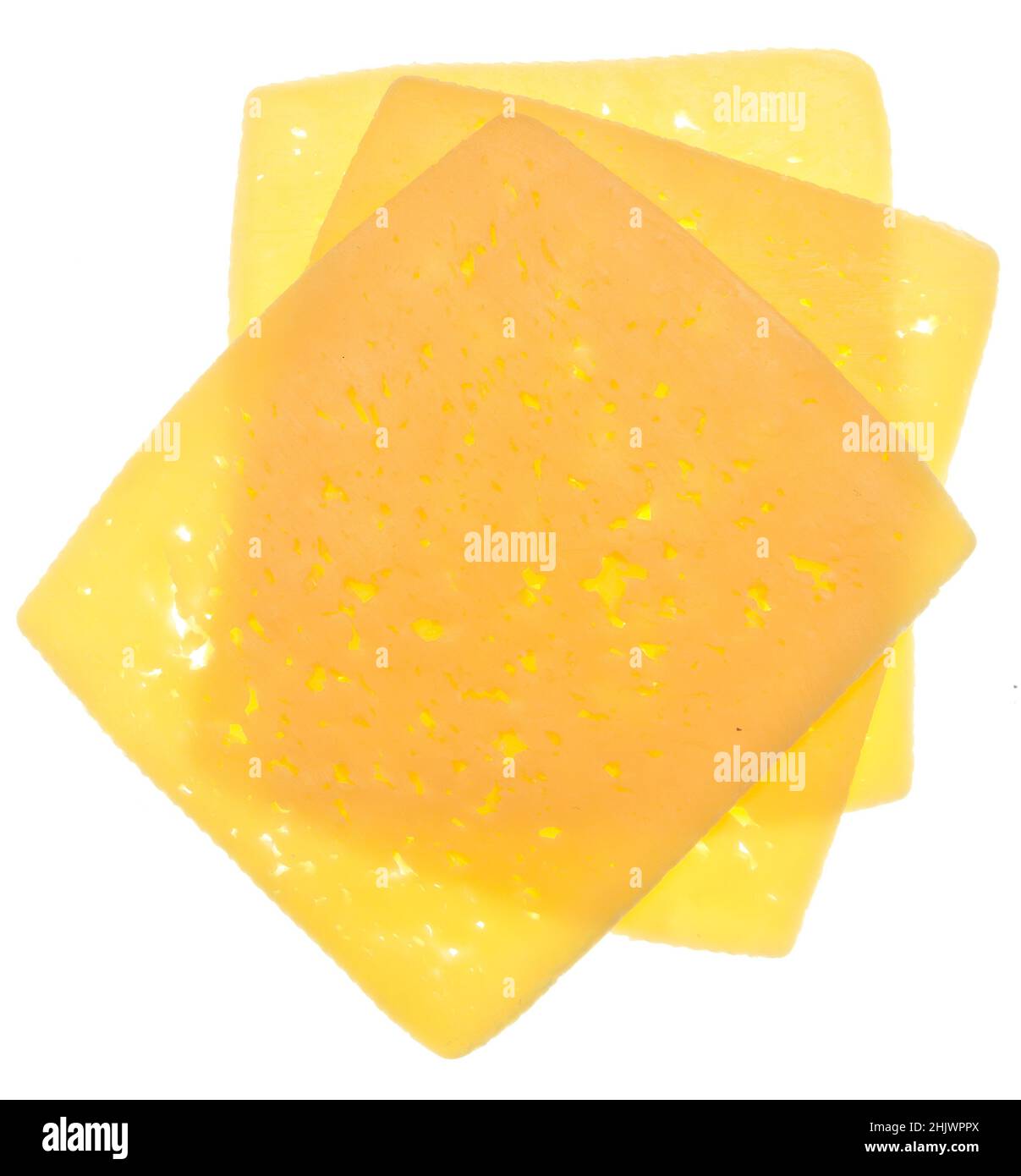 Pile of cheese slices on white background Stock Photo - Alamy