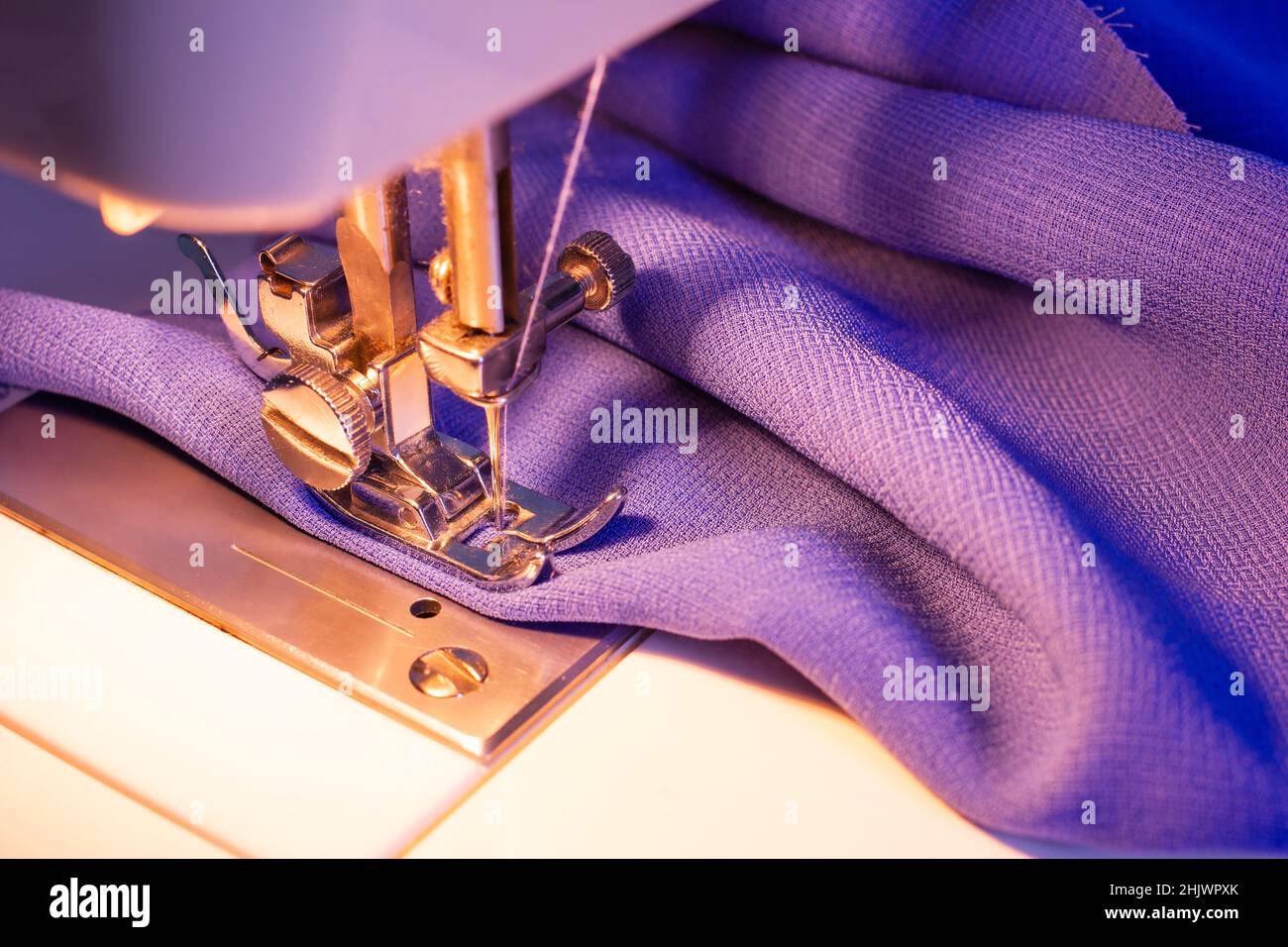 sewing process on a sewing machine, the color of the fabric is very ... sewing process on a sewing machine, the color of the fabric is very ...