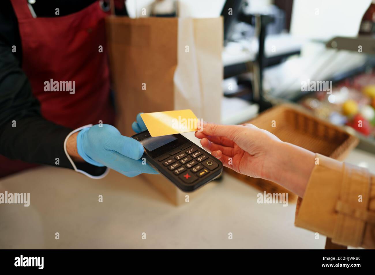 Close up of paying credit card for purchases process Stock Photo - Alamy