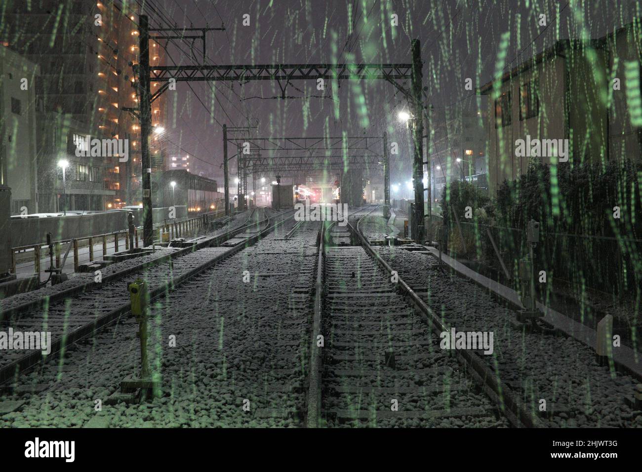 View of Snow falling on the tracks at Sakura Train Station, Chiba ...