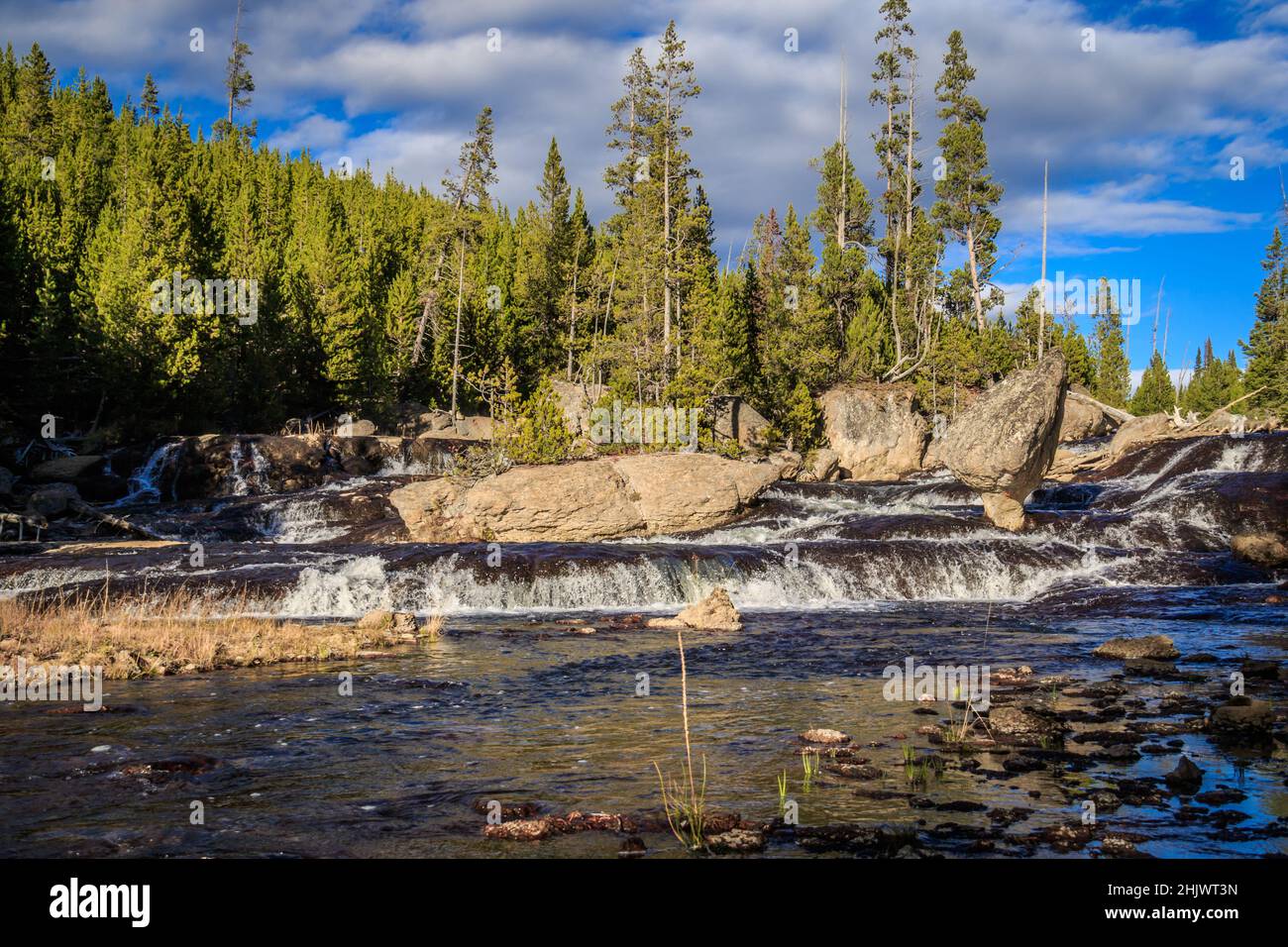 Natural view of the Gibbon River, Glacier National Park in Montana, USA ...