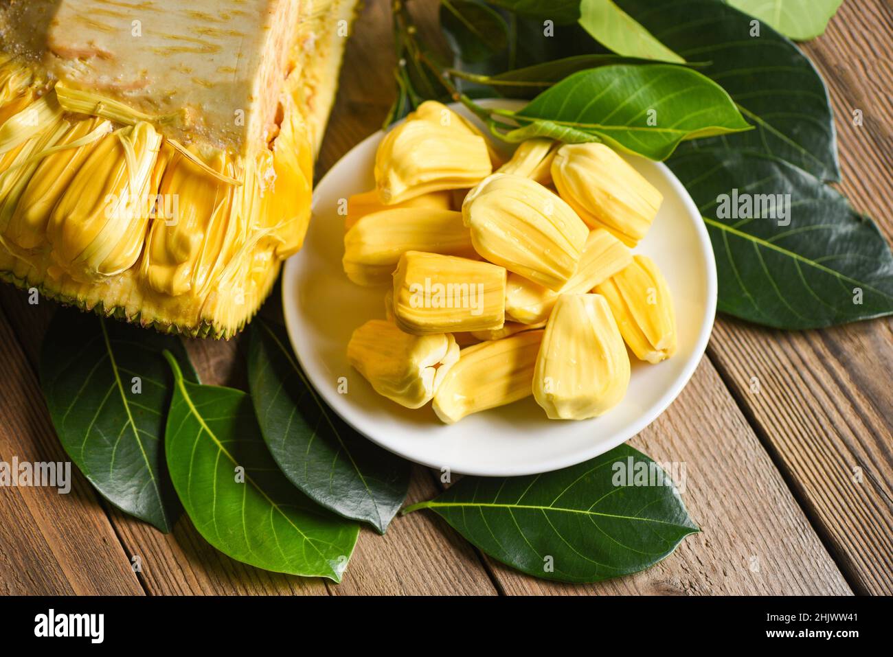 jackfruit on white plate with leaf on wooden background, ripe jackfruit ...