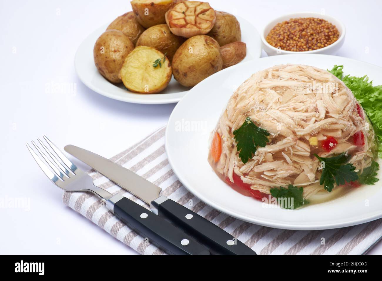 Delicious chicken aspic on a plate isolated on white background Stock ...