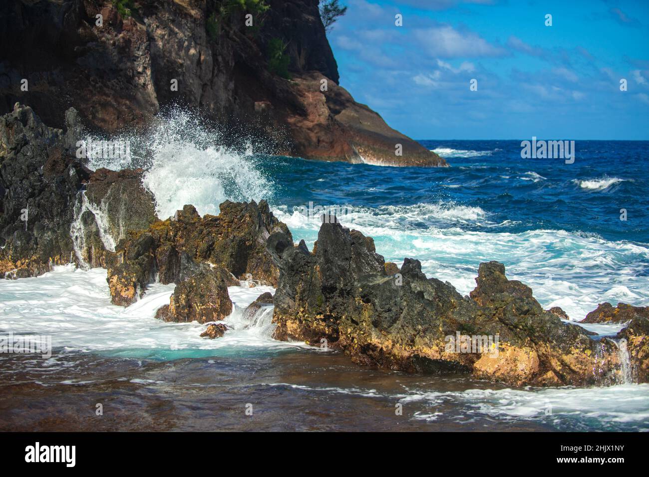 Coastal landscape with blue sea and beautiful cliffs. Stone rocks on ...