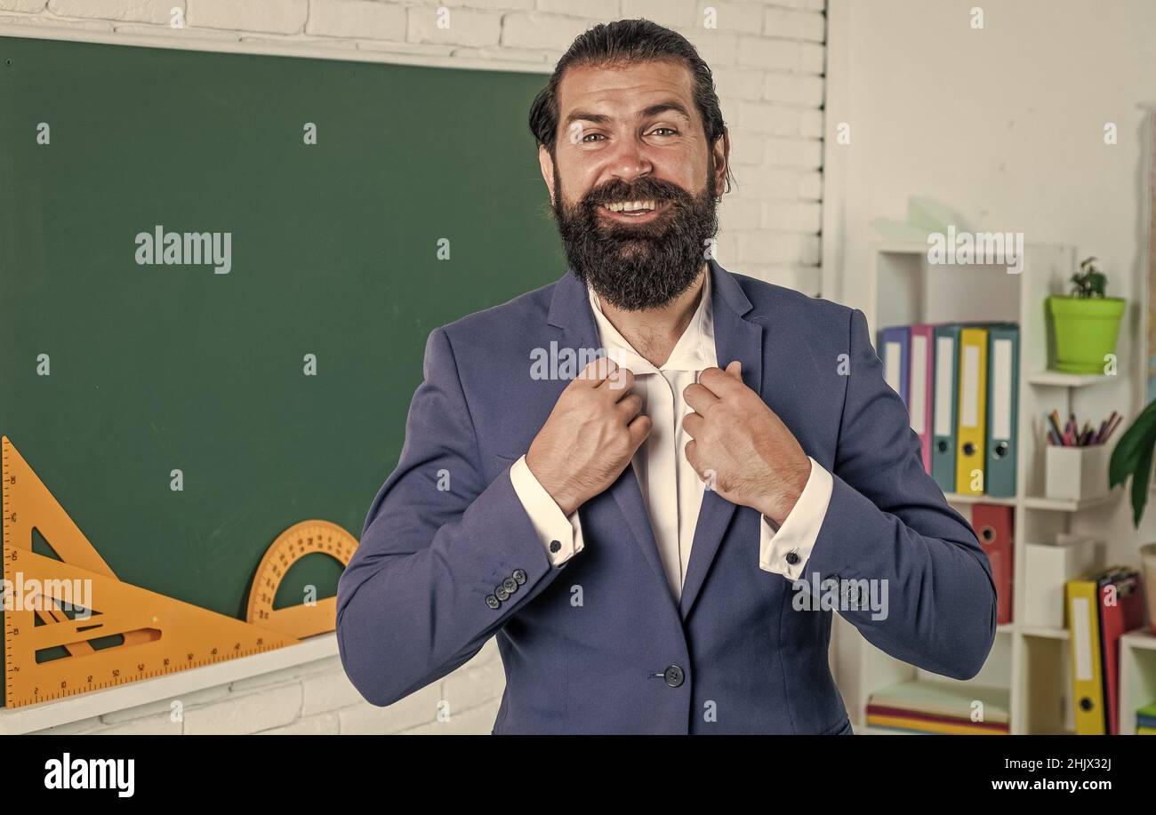 man with beard and moustache look as businessman or teacher in college ...