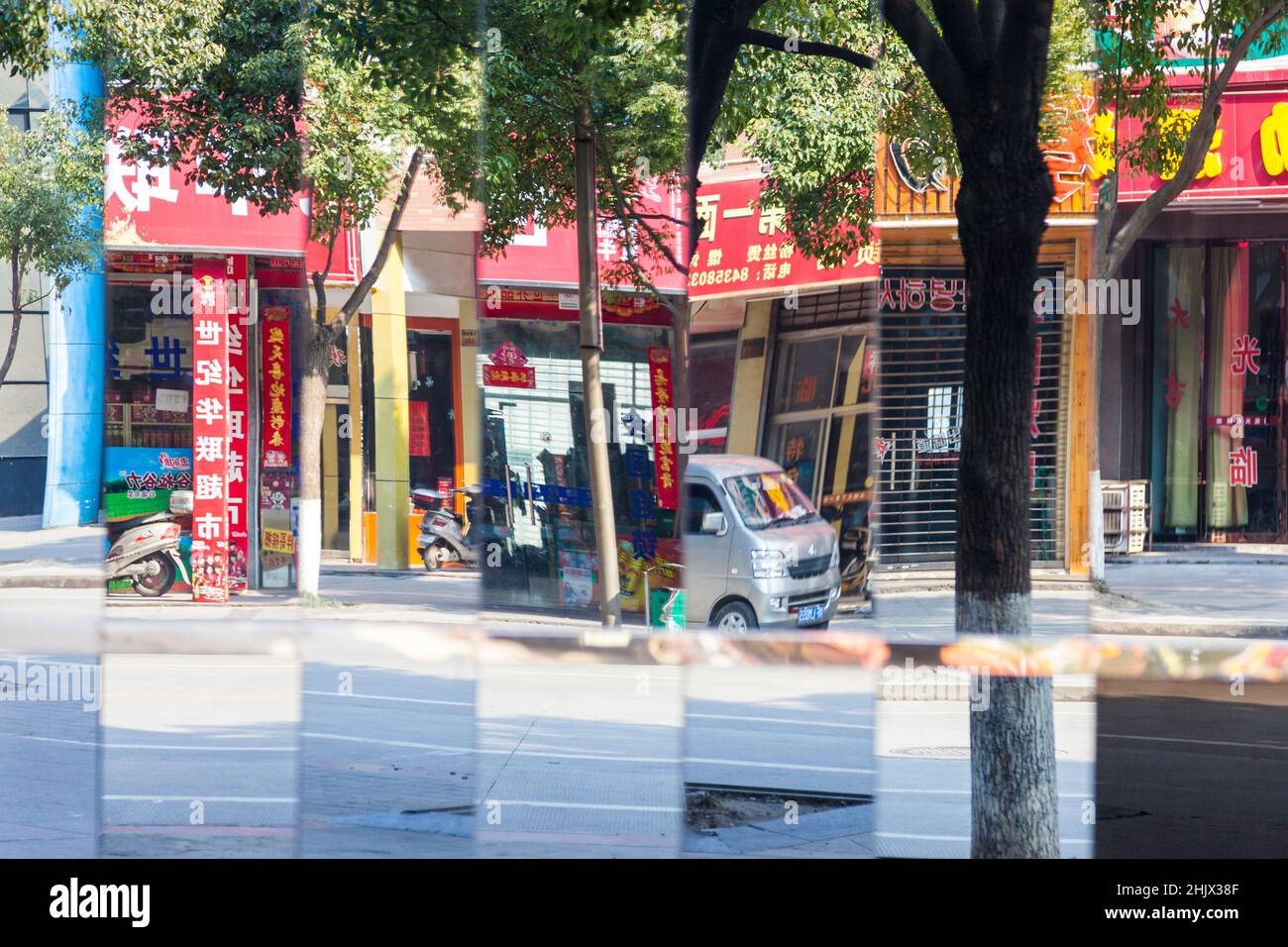 View of a shopping street in Jiashan China, reflected by mirrors Stock ...