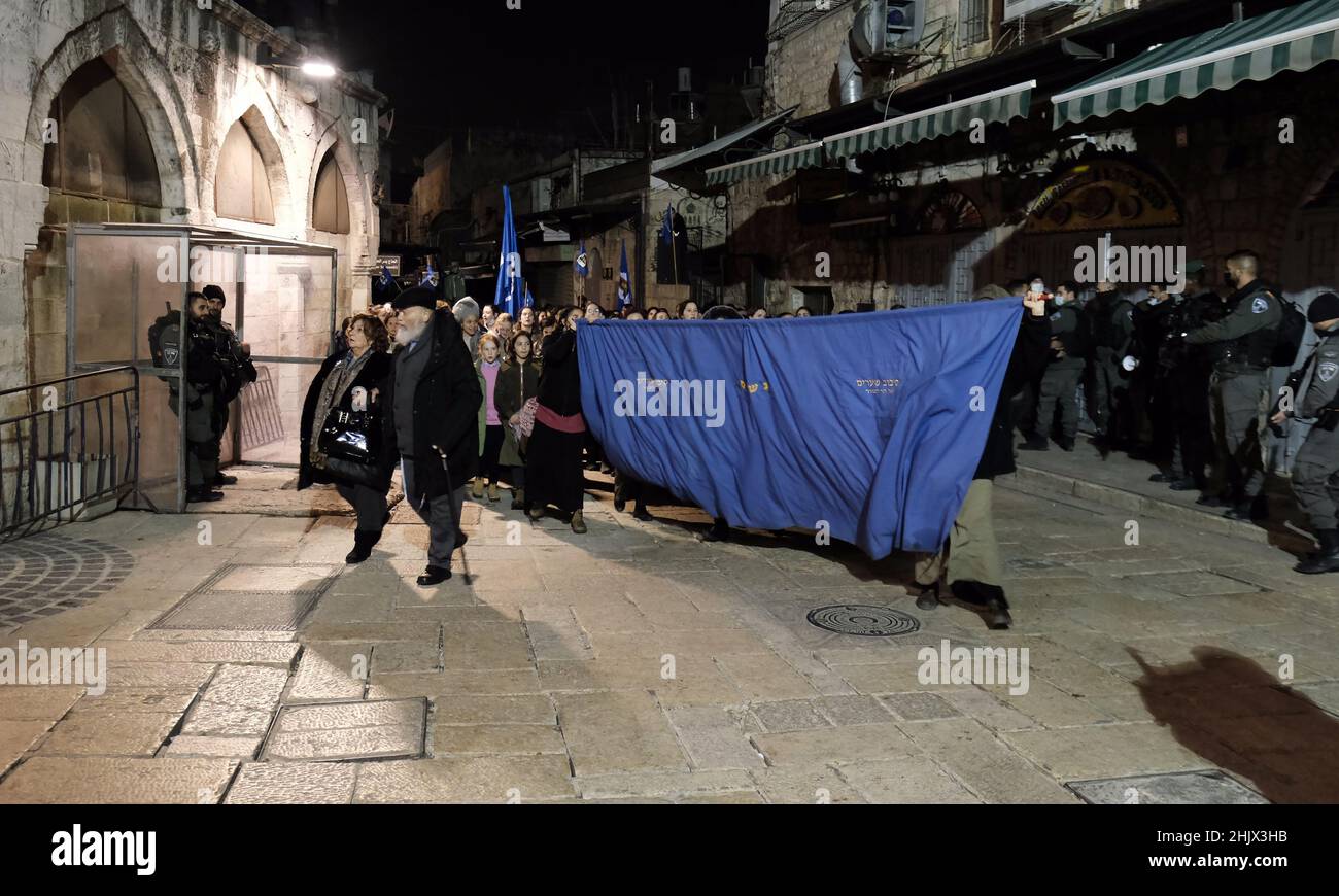 Members of the Israeli Security Forces stand guard as religious Jews ...