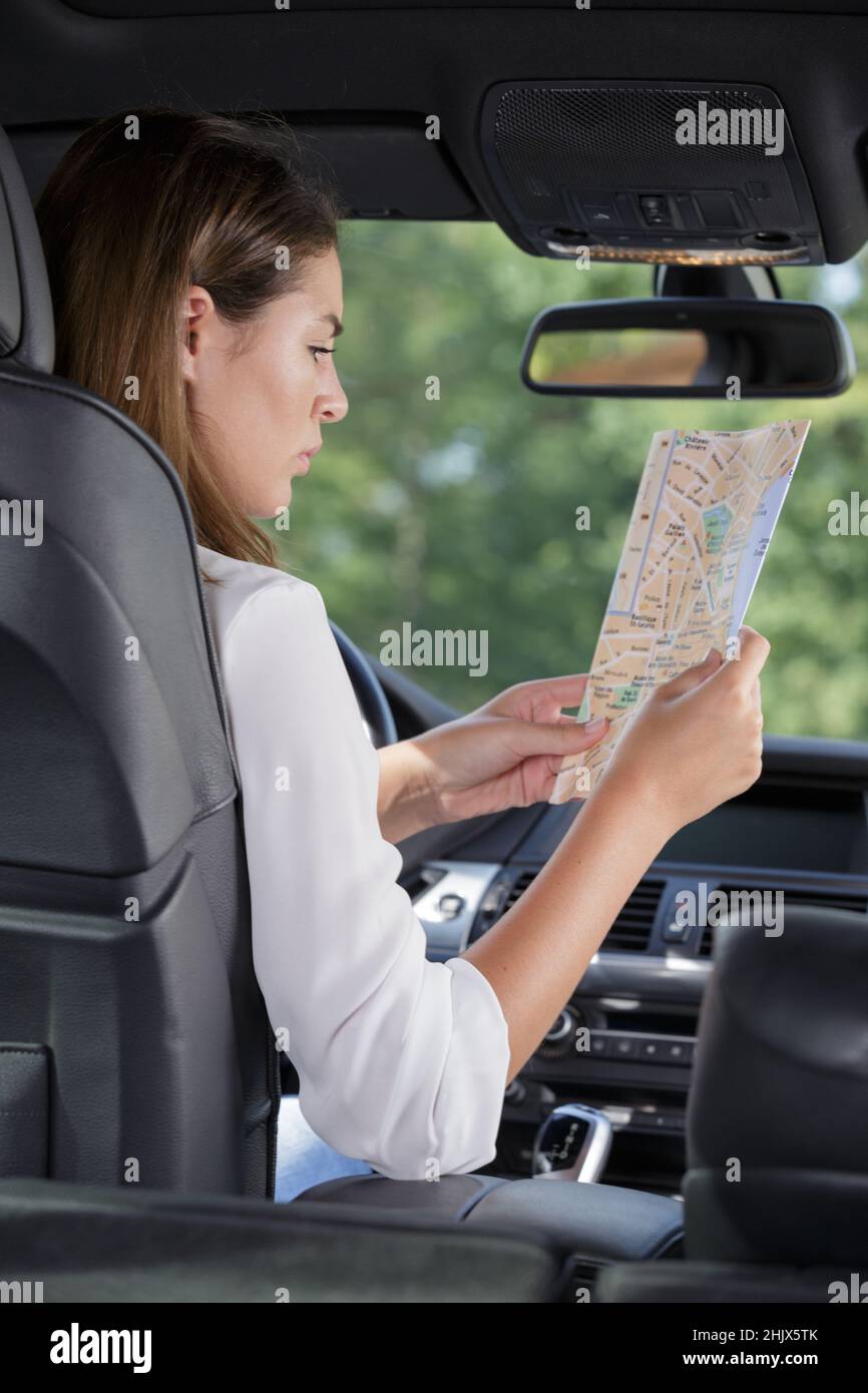 Reading map inside car hi-res stock photography and images - Alamy