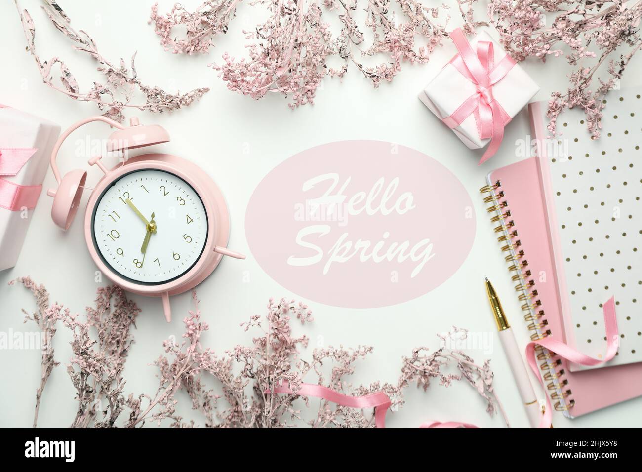 Concept of "Hello Spring" on white background Stock Photo - Alamy