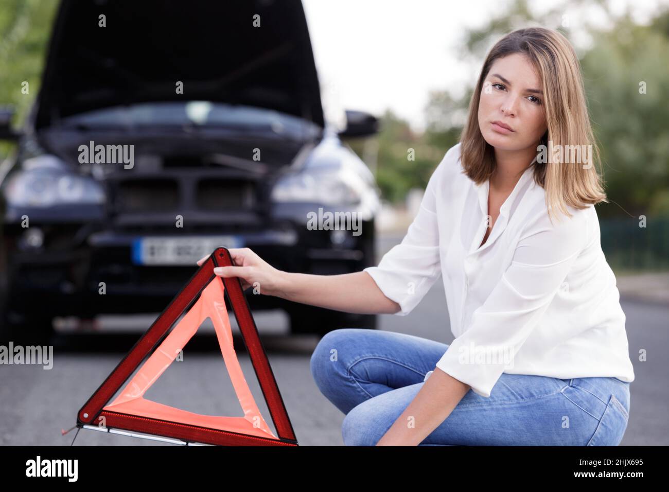 Mechanic holds car tyre hi-res stock photography and images - Alamy