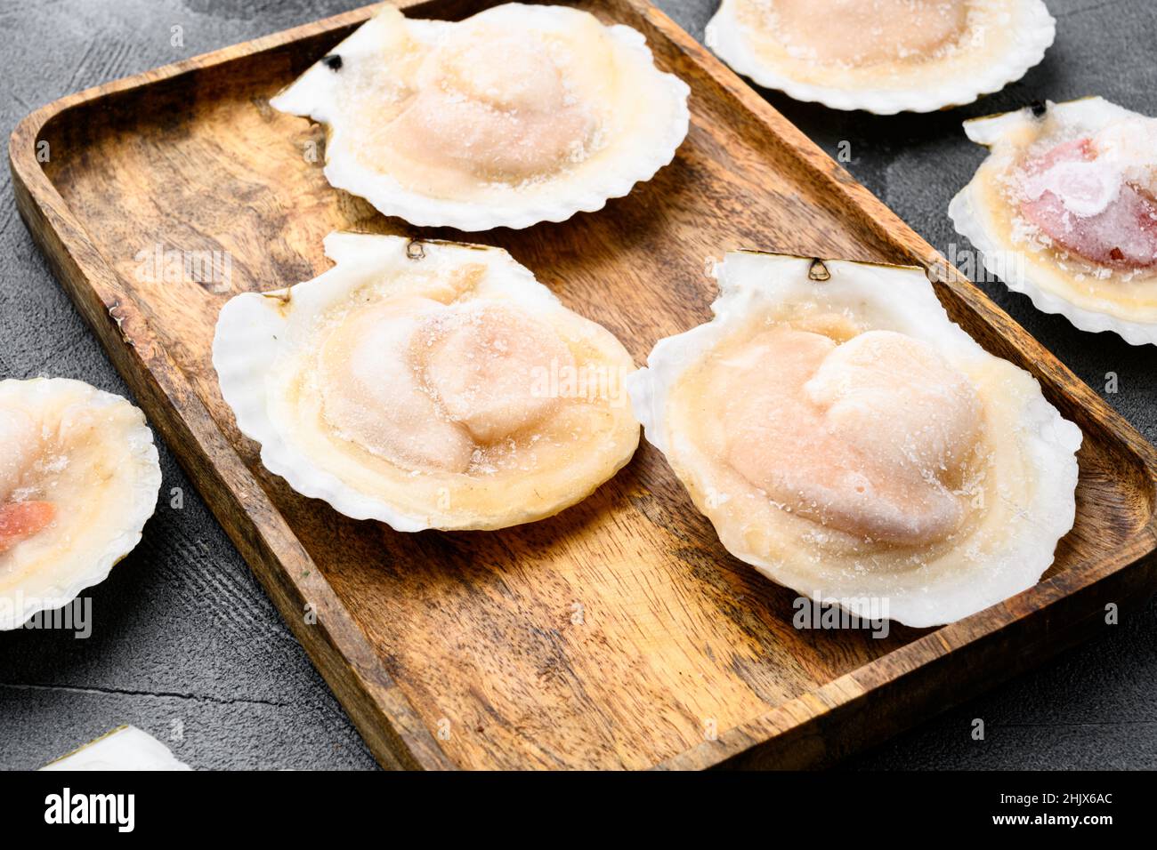 Frozen seafood Scallops set, on gray stone table background Stock Photo ...