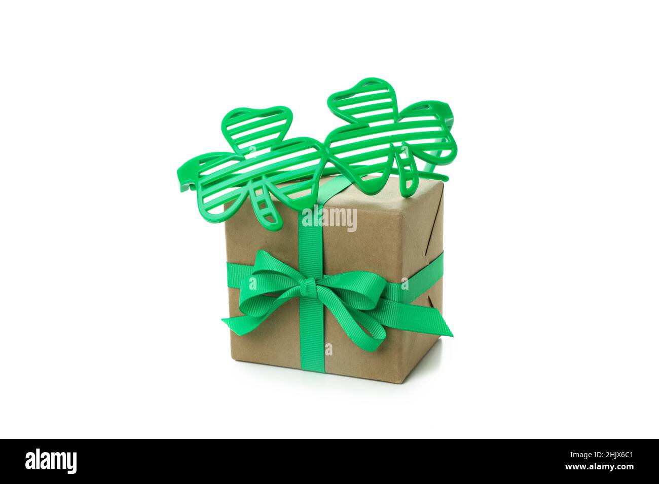 Clover leaf glasses and gift box isolated on white background Stock ...