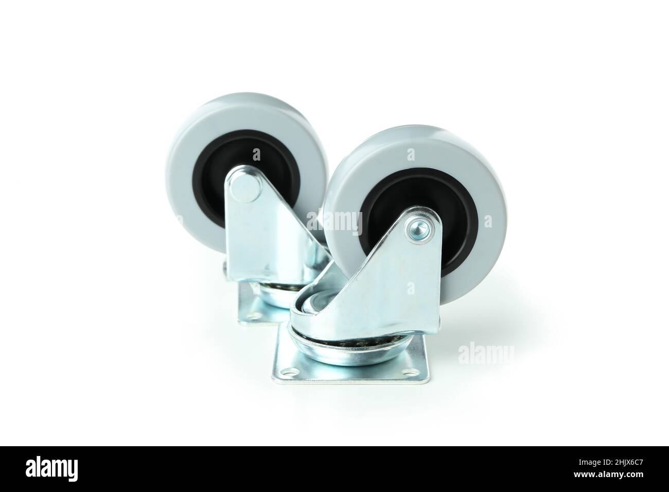 Trolley wheels isolated on white background, close up Stock Photo - Alamy