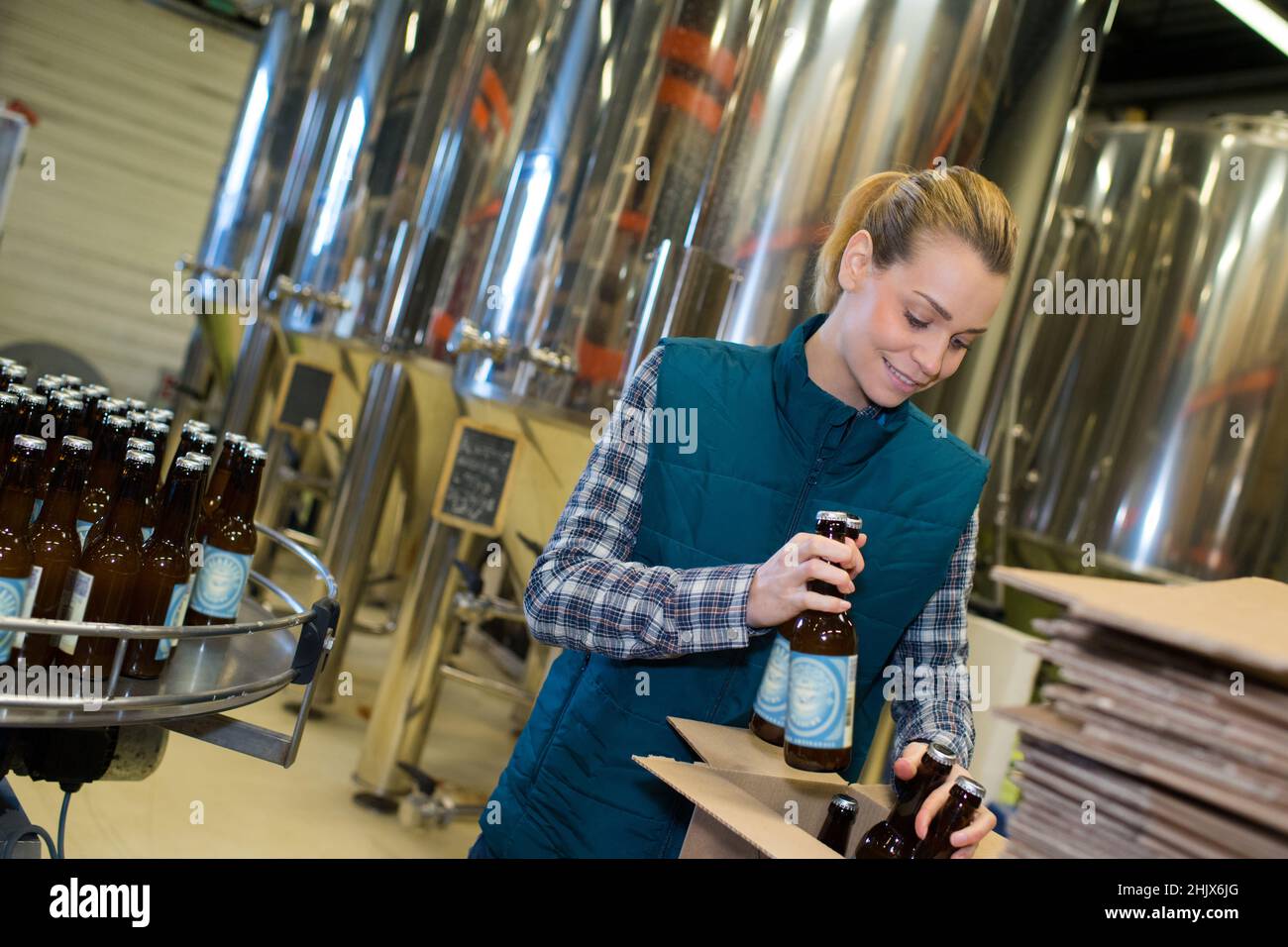 female packaging worker Stock Photo - Alamy