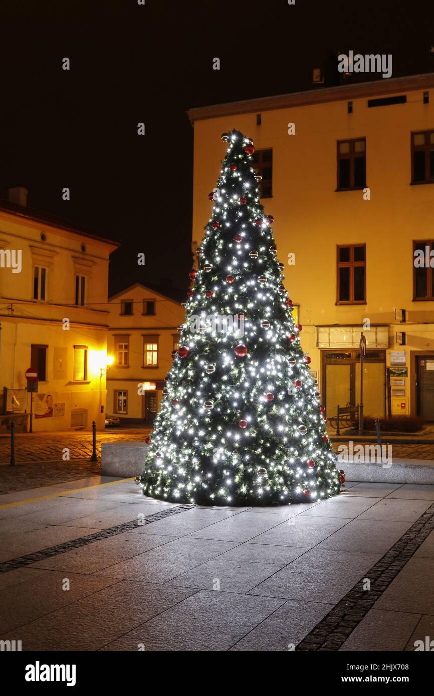 Traditional big christmas tree beautifully iluminated with colorful ...