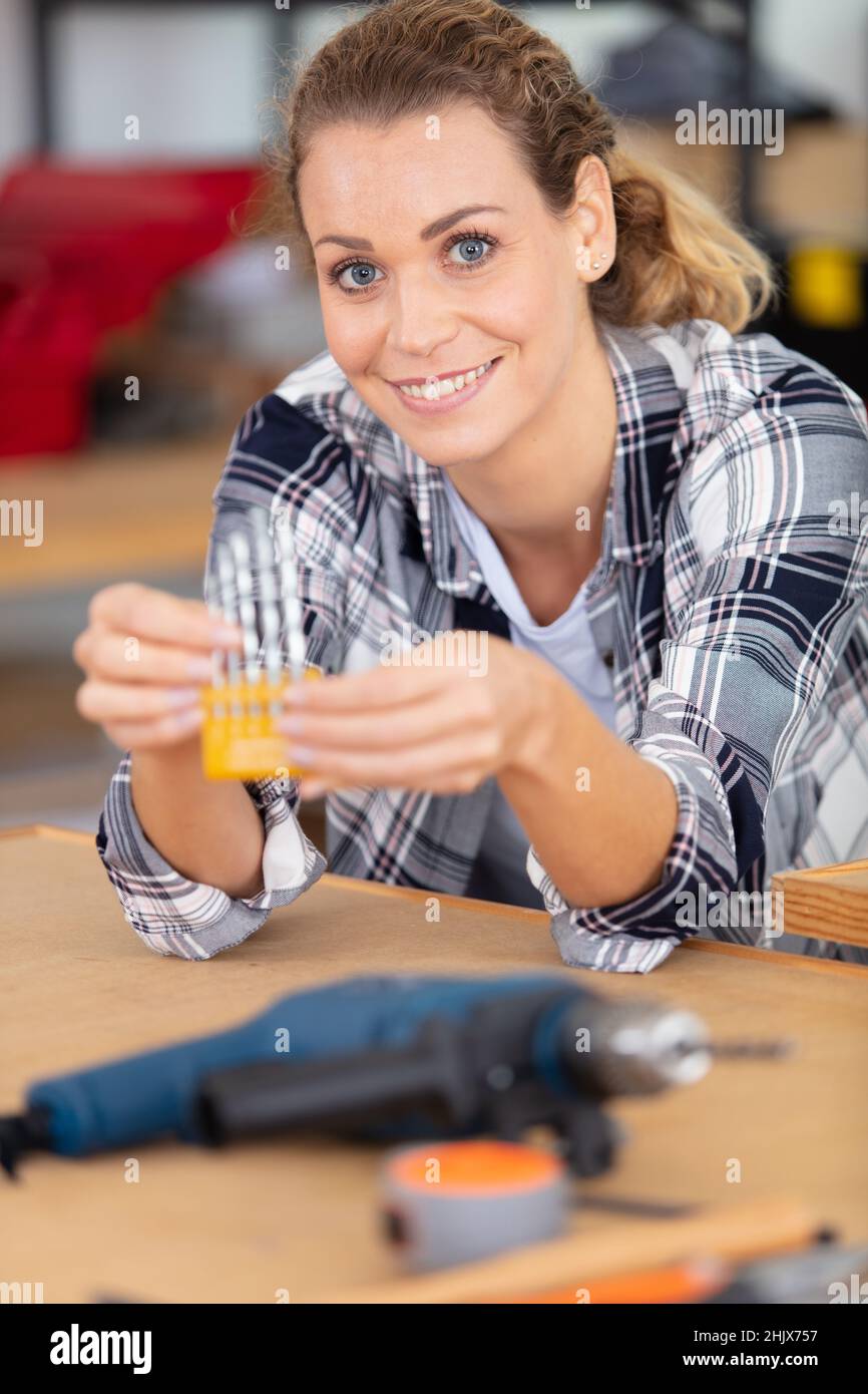 concentrated young female carpenter beautiful Stock Photo - Alamy