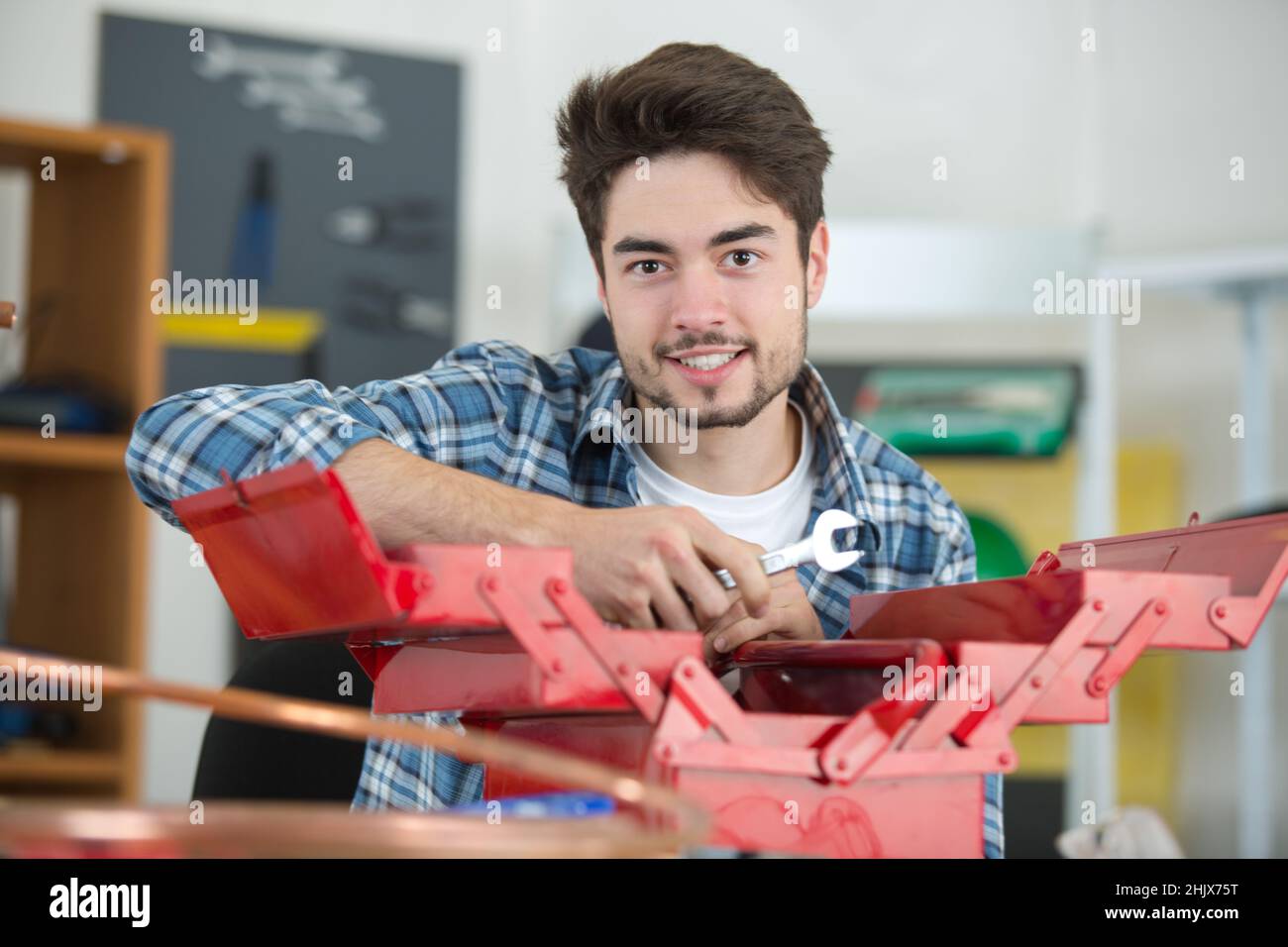man selecting working with tool-box Stock Photo - Alamy