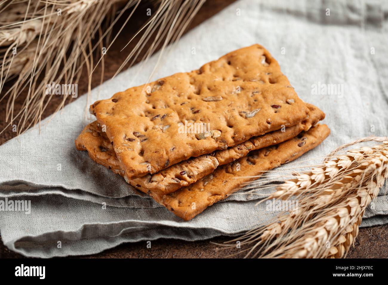Fresh baked flat multigrain bread Stock Photo - Alamy