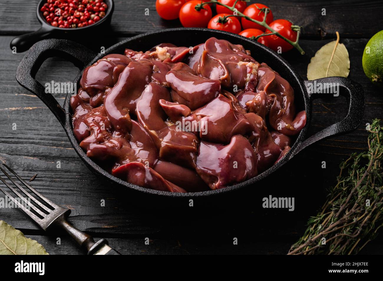 Fresh duck liver offal set, on black wooden table background Stock ...