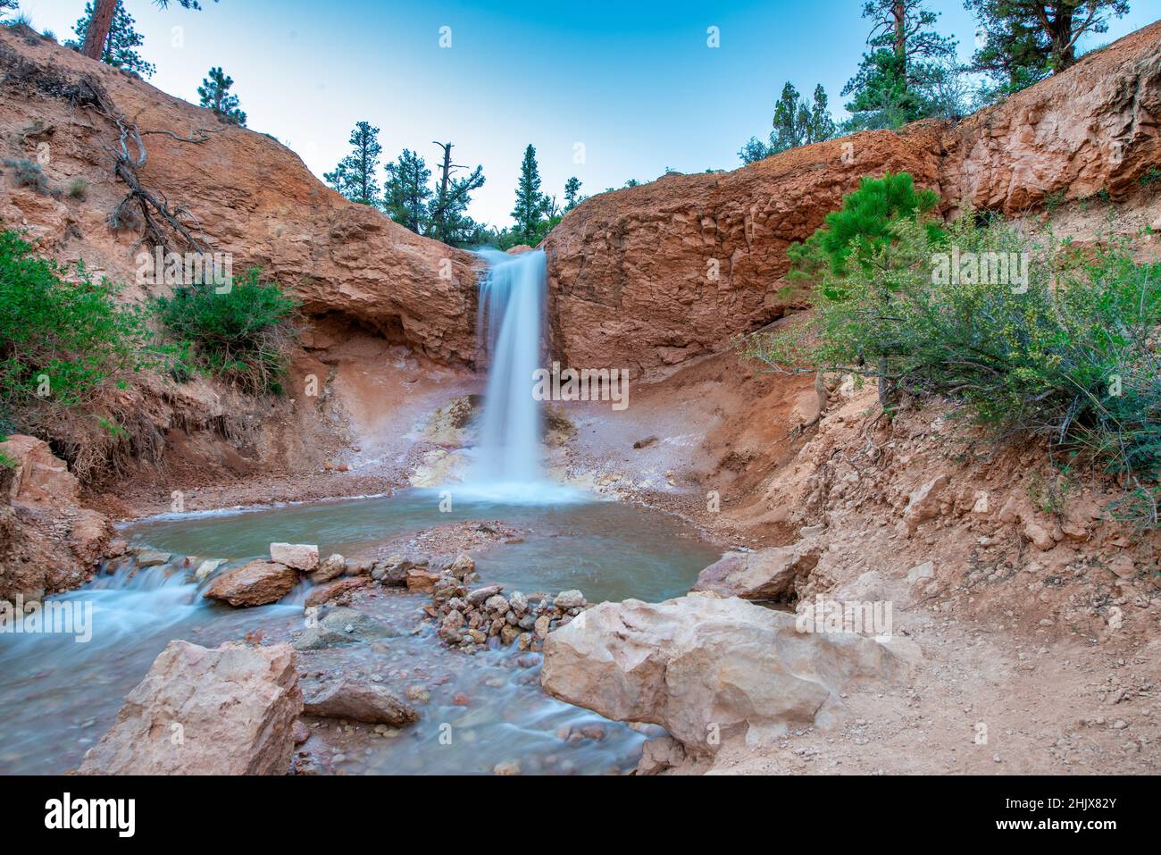 Waterfalls in Mossy Cave Trail at sunset, Bryce Canyon National Park in ...