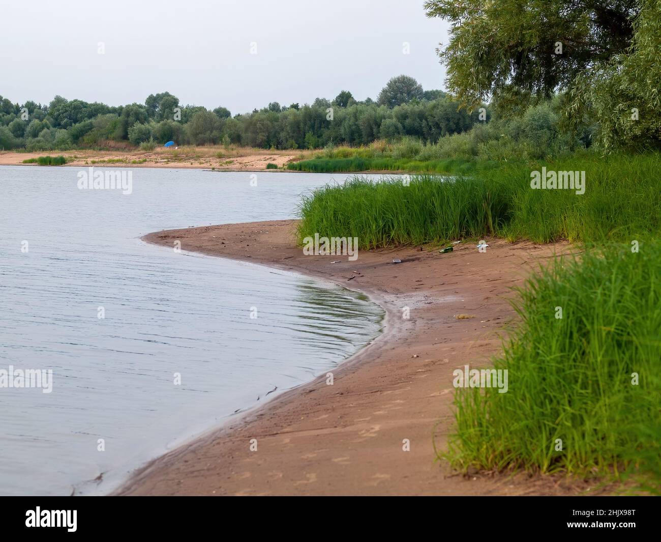 sandy river bank on a clear day, in summer Stock Photo - Alamy