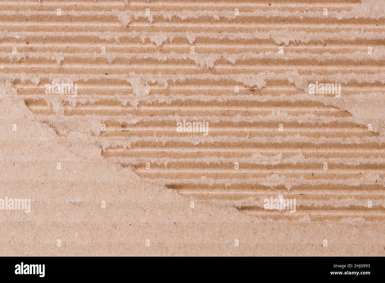 torn brown packing cardboard. background for design. High quality photo ...