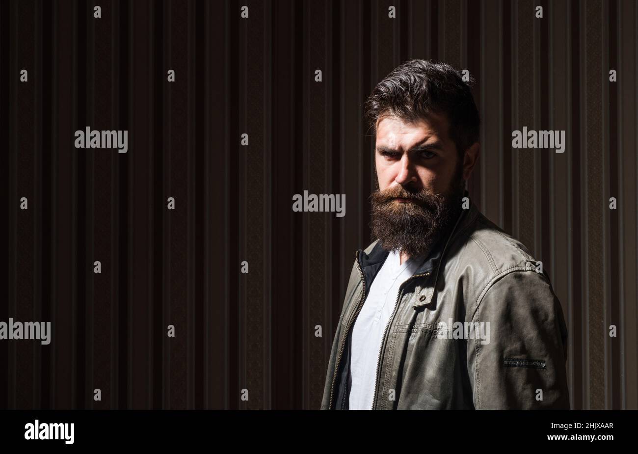 Brutal angry gang man lifestyle, serious handsome guy Stock Photo - Alamy