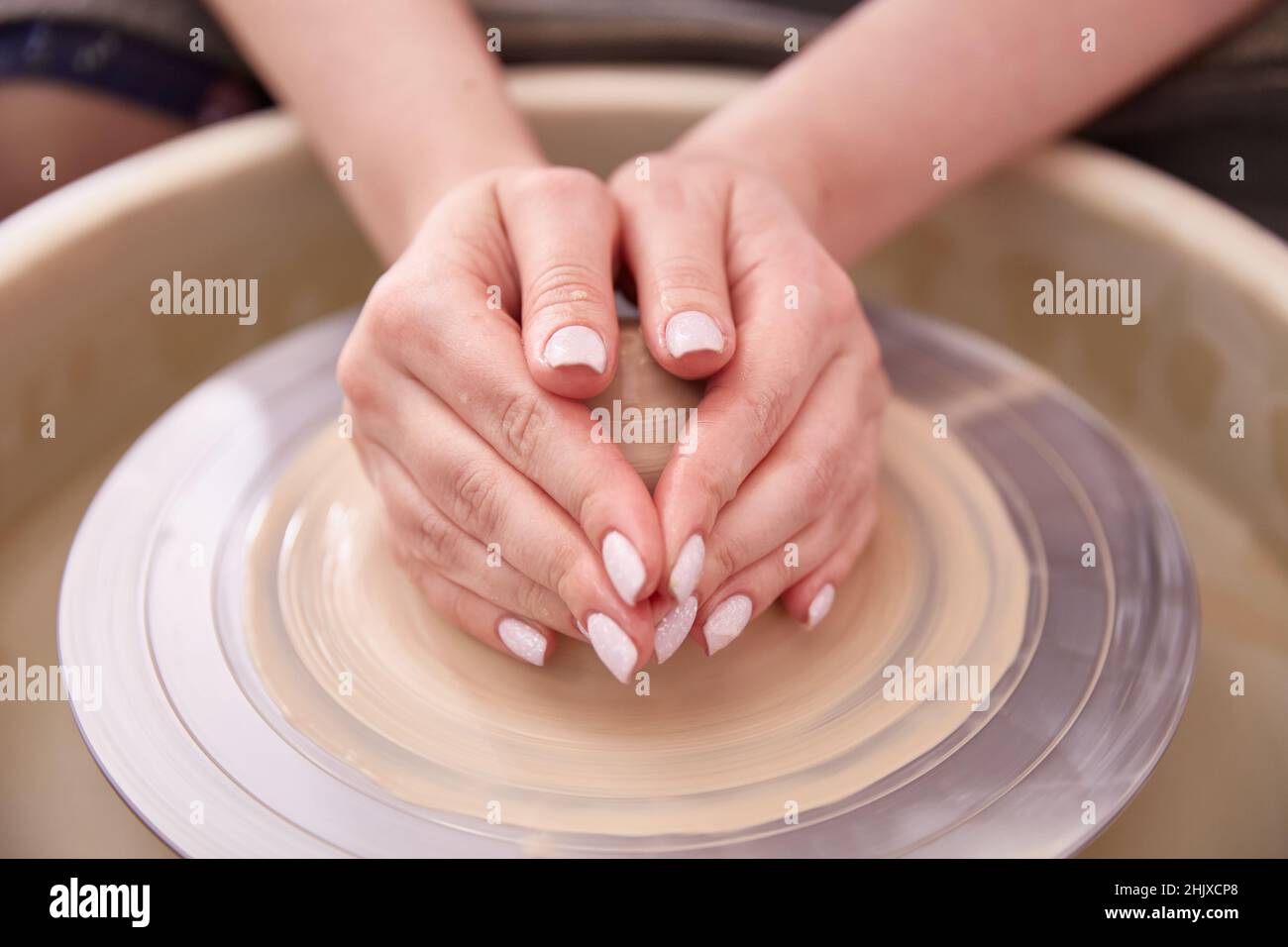 Potters hands shaped cup hi-res stock photography and images - Alamy