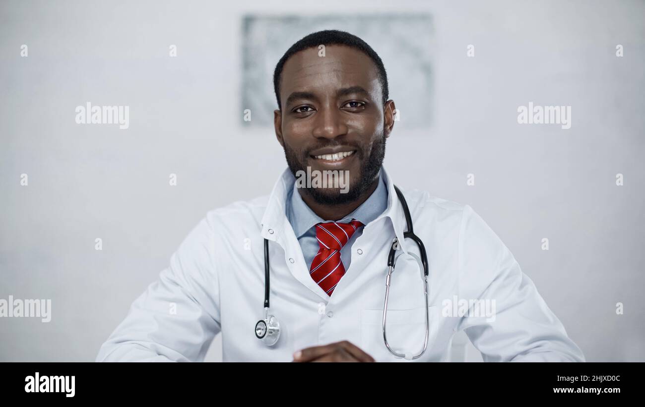happy african american doctor with stethoscope looking at camera Stock ...