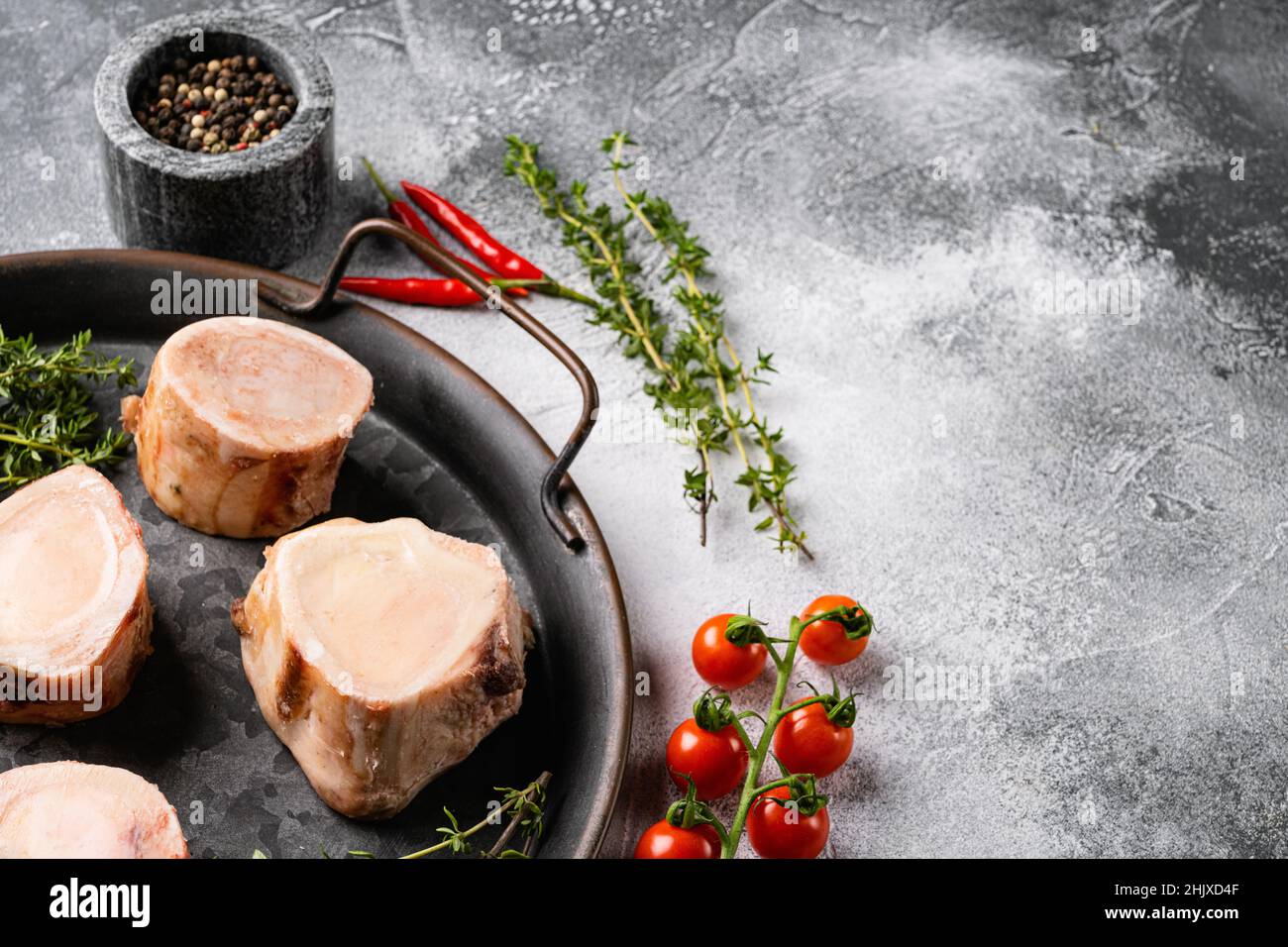 Beef Bones for Making Broth set, on gray stone table background, with ...