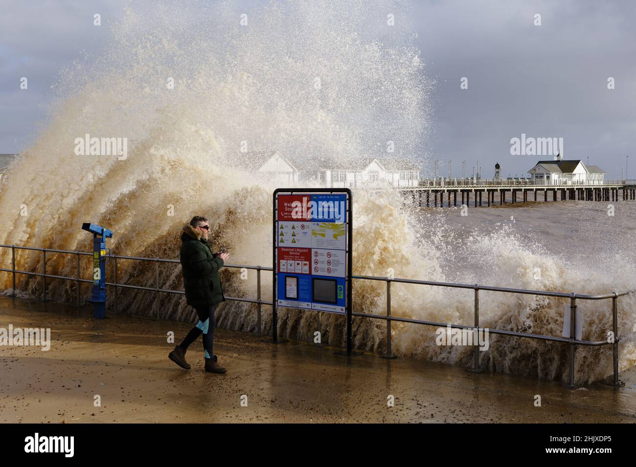 Person very close, photographing the crashing waves at high tide ...