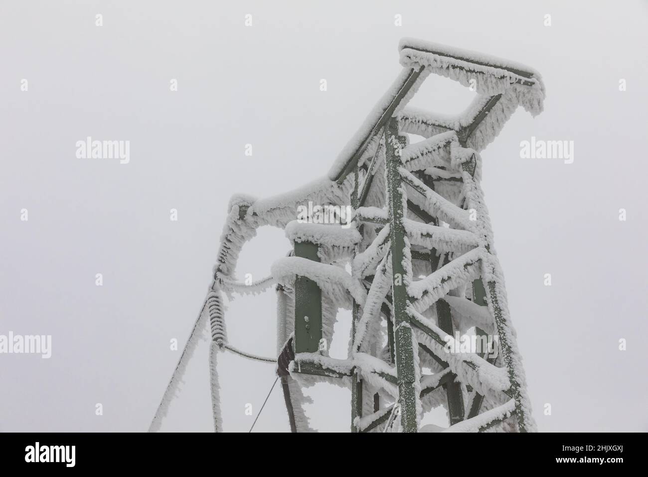 Electricity pylons covered in snow hi-res stock photography and images ...