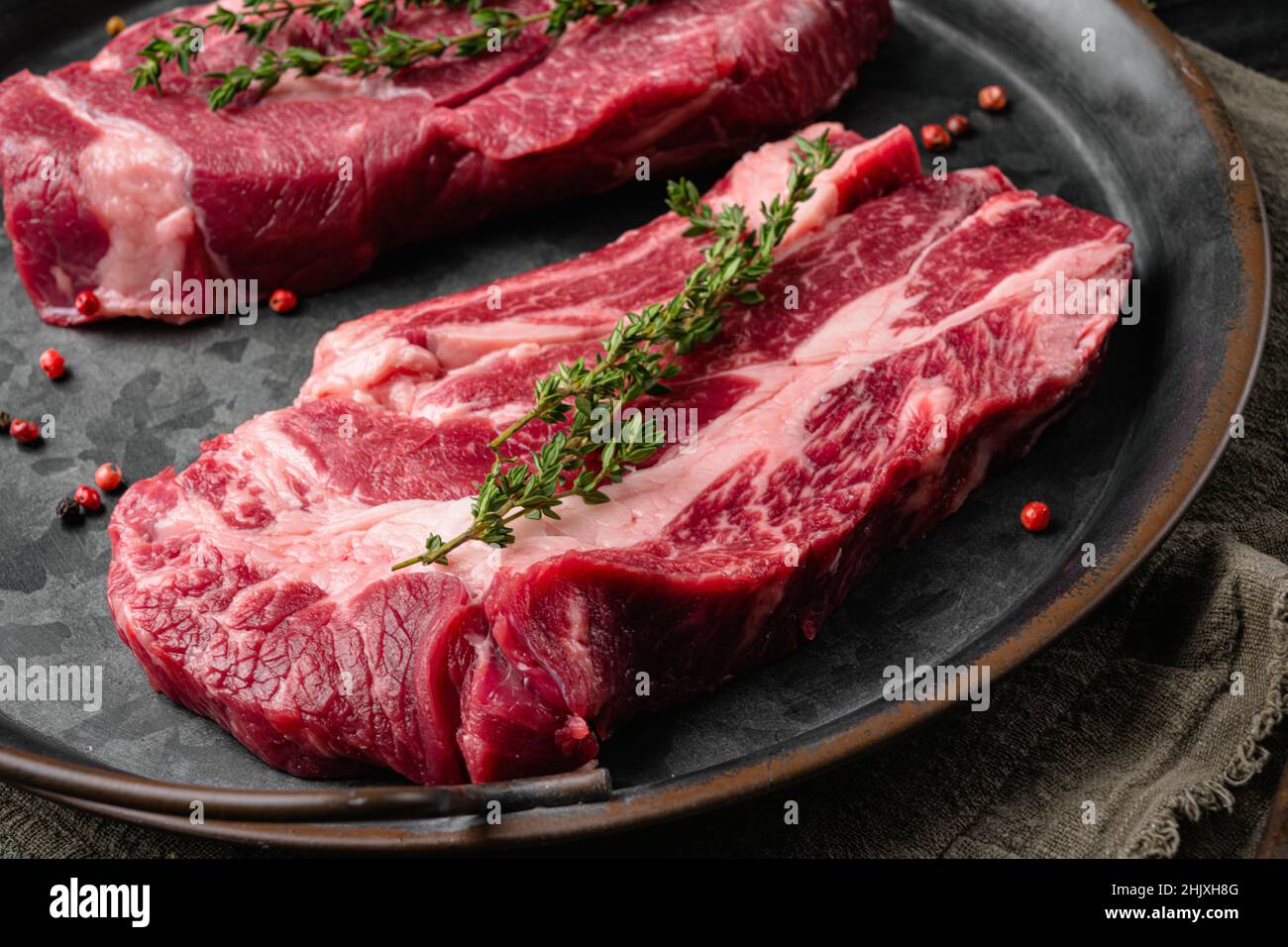 Raw meat steaks set, on old dark wooden table background Stock Photo ...