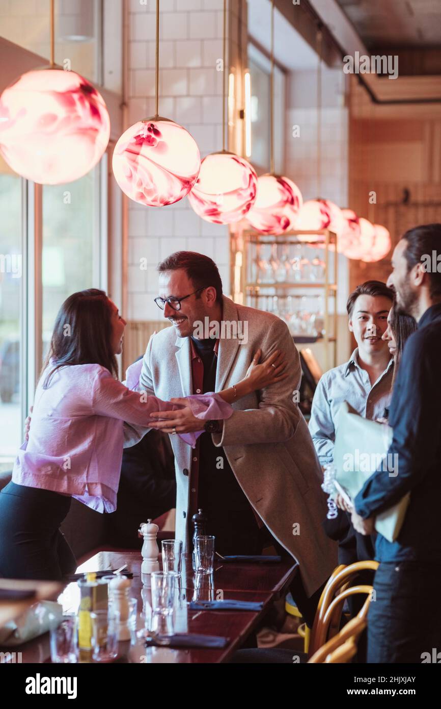 Male friends greeting hi-res stock photography and images - Alamy