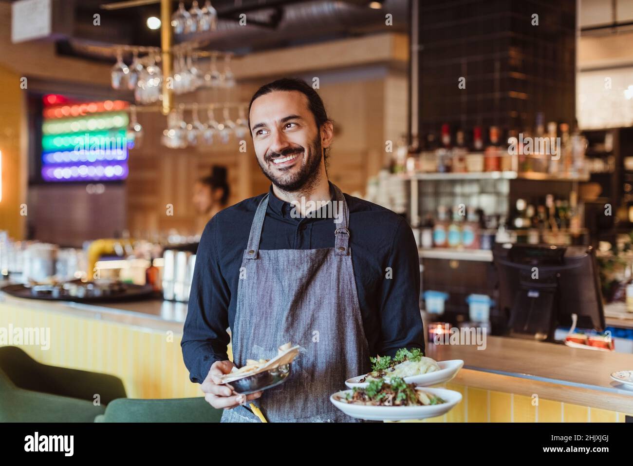 Male waiter hi-res stock photography and images - Alamy