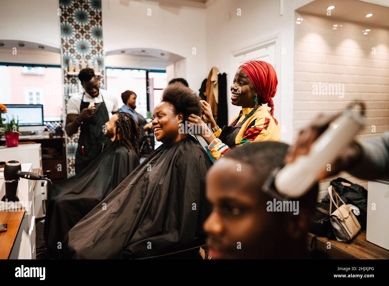 Group of african men at barber shop hi-res stock photography and images ...