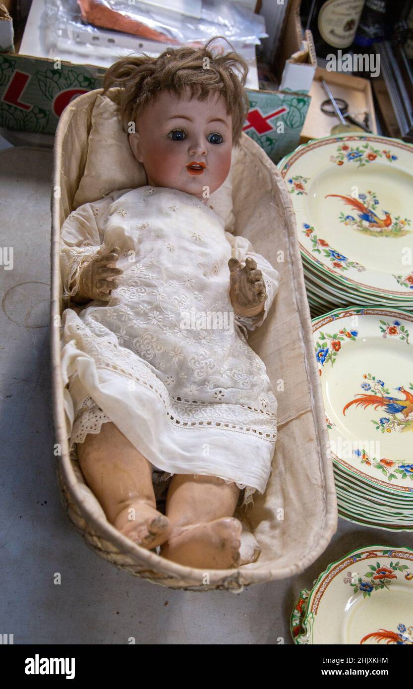 Vintage doll on display at auction room, UK Stock Photo - Alamy