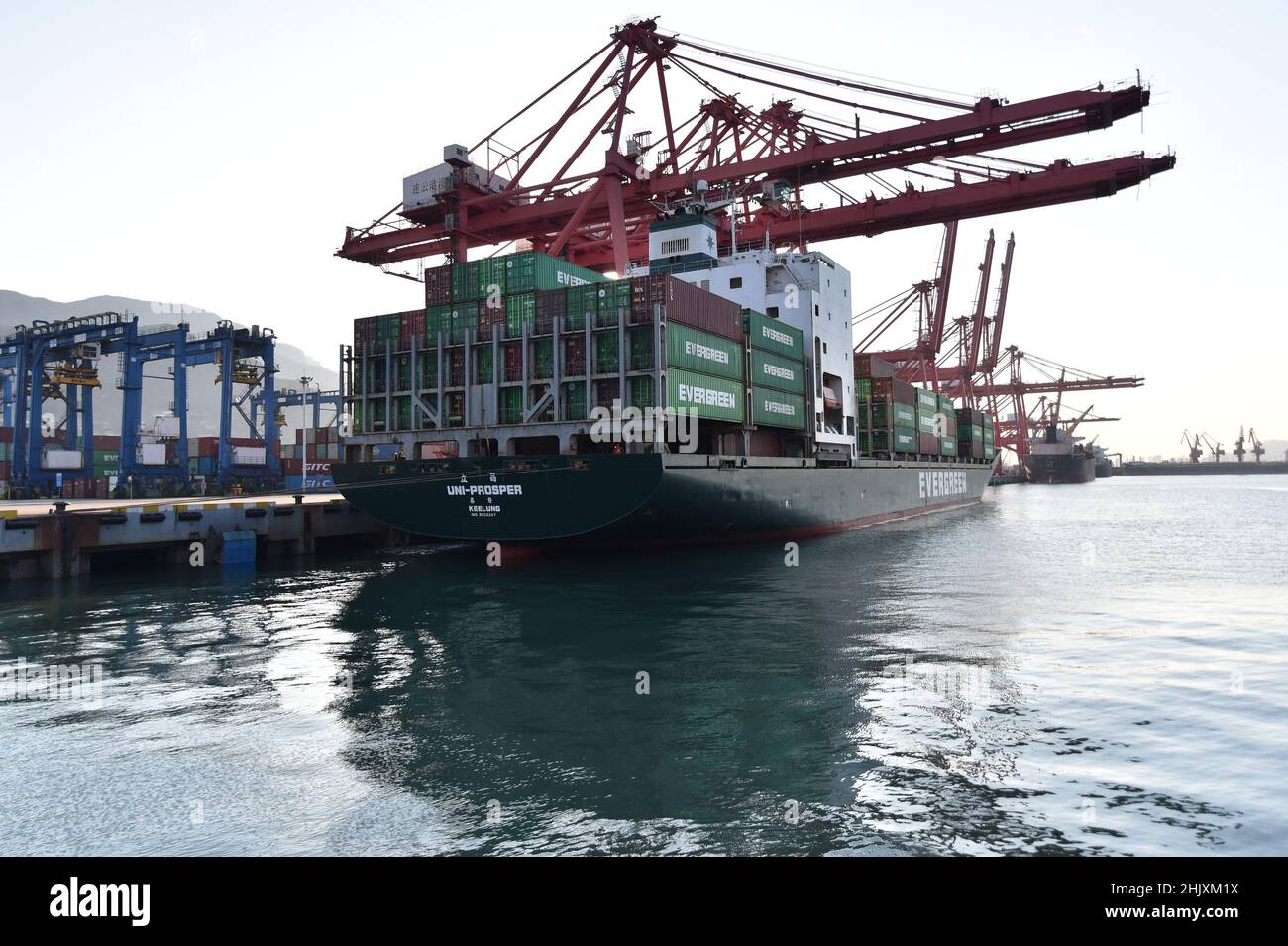 LIANYUNGANG, CHINA - FEBRUARY 1, 2022 - Container liners load and ...