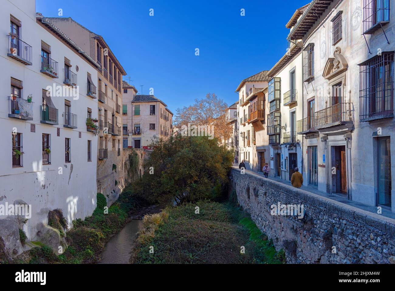 GRANADA ANDALUCIA SPAIN SAN PEDRO AREA HOUSES ALONG RIVER DARRO AND THE ...