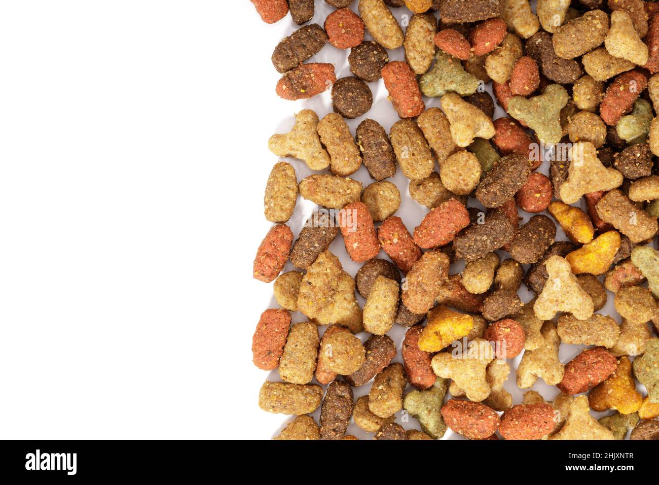 a bunch of dry animal feed is isolated on a white background. Top view ...